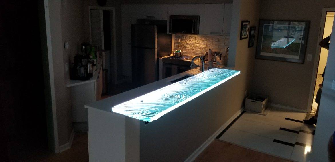 Add a Raised Glass High Bar to your Kitchen Island.