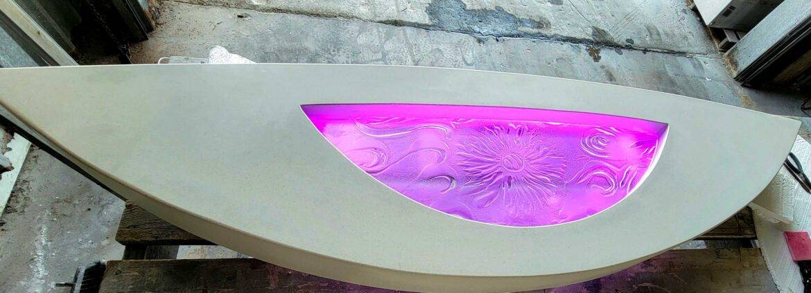 Floating glass trough sink...a cool glass sink design.